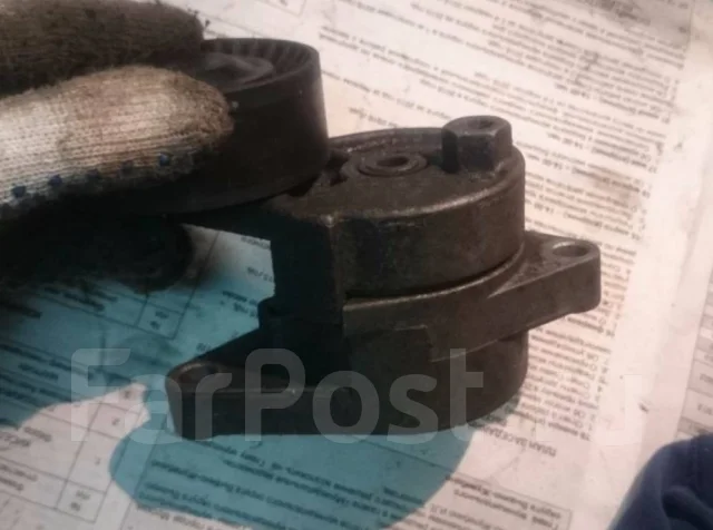 Ролик с натяжителем M52 BMW E39 1433571 в Москве