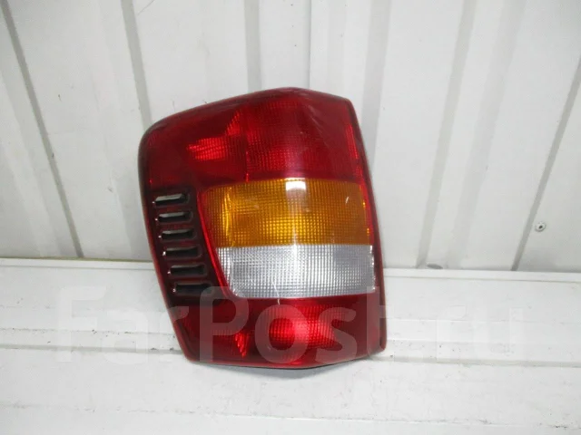 Фонарь L Jeep Grand Cherokee WJ 1999-2004 в Москве