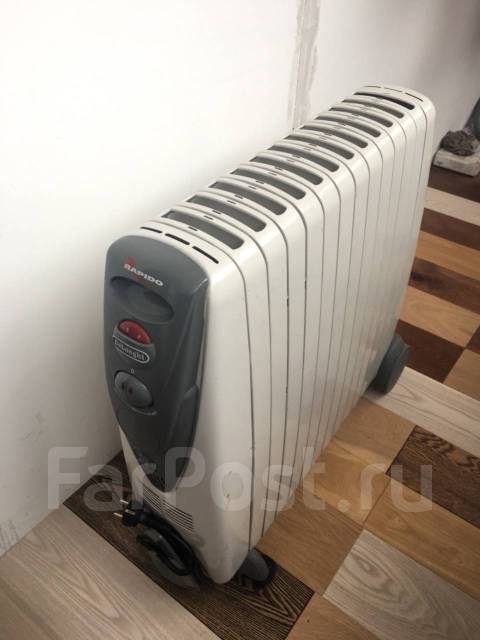 Готовь печку летом! Масляный обогреватель DeLonghi Rapido (Италия ...