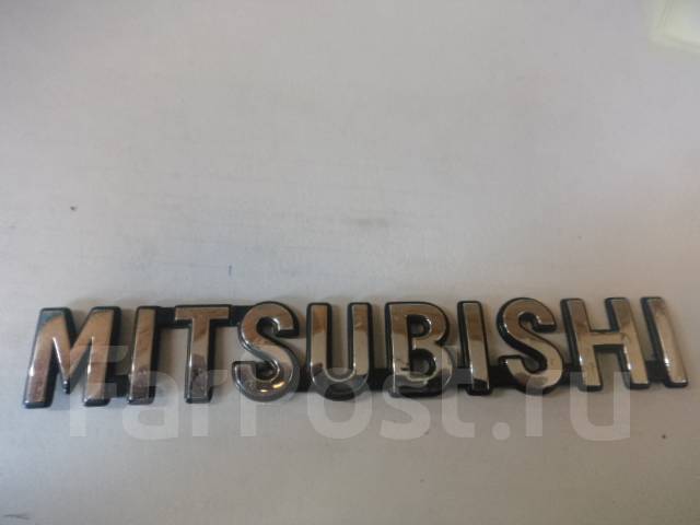 Эмблема на крышку багажника (логотип Lancer) MB880720 Mitsubishi Lancer ...