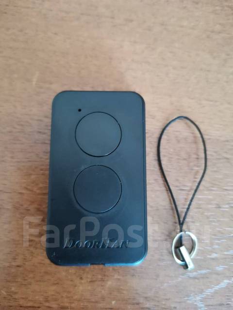 Пульт для шлагбаума Transmitter 2-PRO 2-х канальный 433МГц Doorhan ...