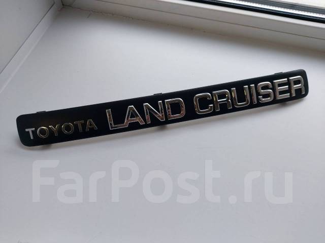 Эмблема подсветки заднего номера Toyota LAND Cruiser HDJ101, UZJ100 98 ...