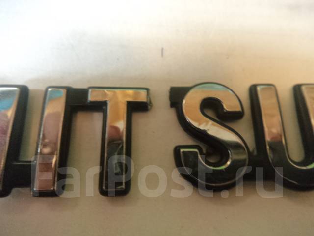 Эмблема на крышку багажника (логотип Lancer) MB880720 Mitsubishi Lancer ...