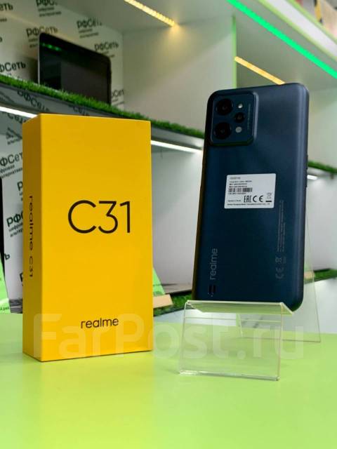 Realme C31 - 6.5", 2Sim, 13МП, 8x1.8GHz, 5000mAh, 4/64Gb. РФСеть ...
