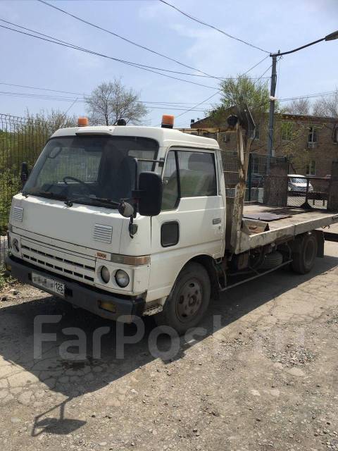 Nissan, 1990, MGH40, ED33 во Владивостоке