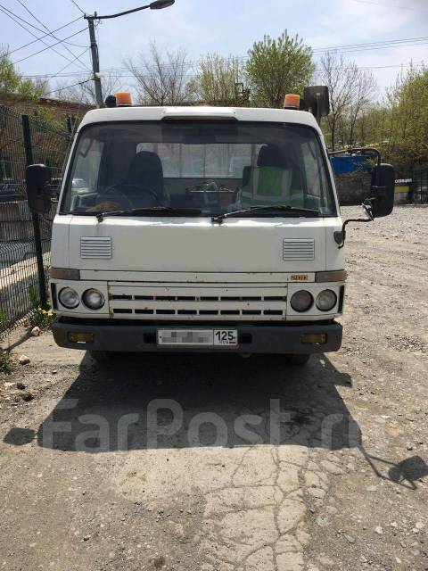 Nissan, 1990, MGH40, ED33 во Владивостоке