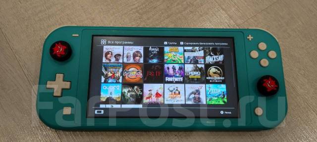 Nintendo Switch Lite + SD128Gb + 19 игр + чехол-аккумулятор, б/у, в ...