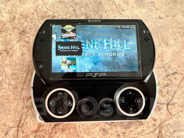 Sony PSP PlayStation Portable Go 16GB + много игр во Владивостоке, б/у, в наличии. Цена: 7 500₽